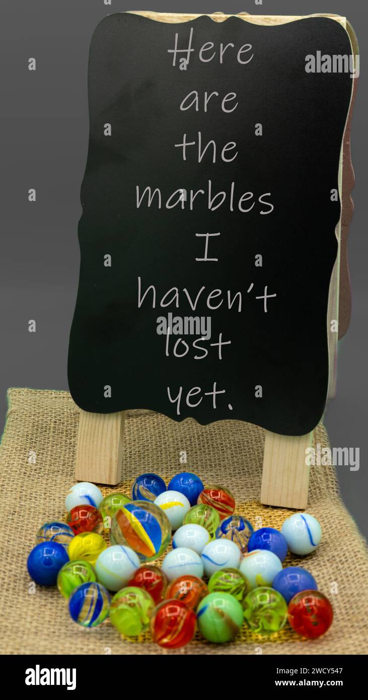 Funny sign marbles hi-res stock photography and images - Alamy