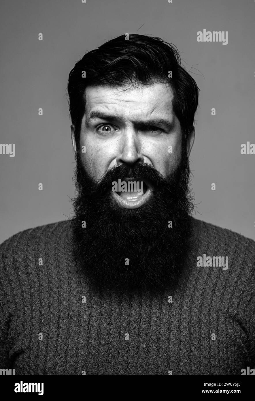 Happy excited handsome bearded man Black and White Stock Photos ...