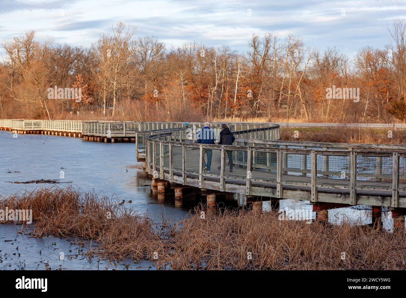 Milford, Michigan - Hikers on a nature trail in Kensington Metropark ...