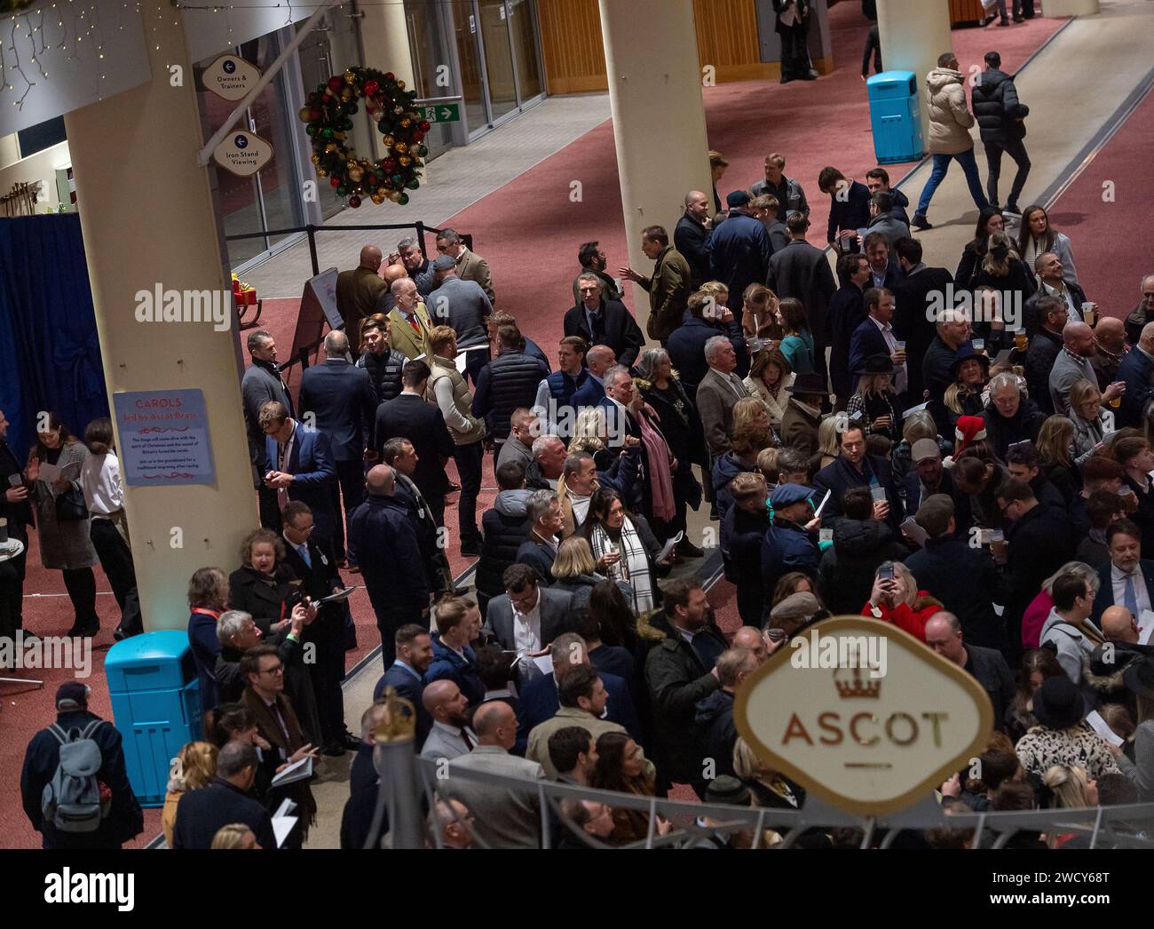 Ascot, Berkshire, UK. 22nd December, 2023. Racegoers singing at the ...