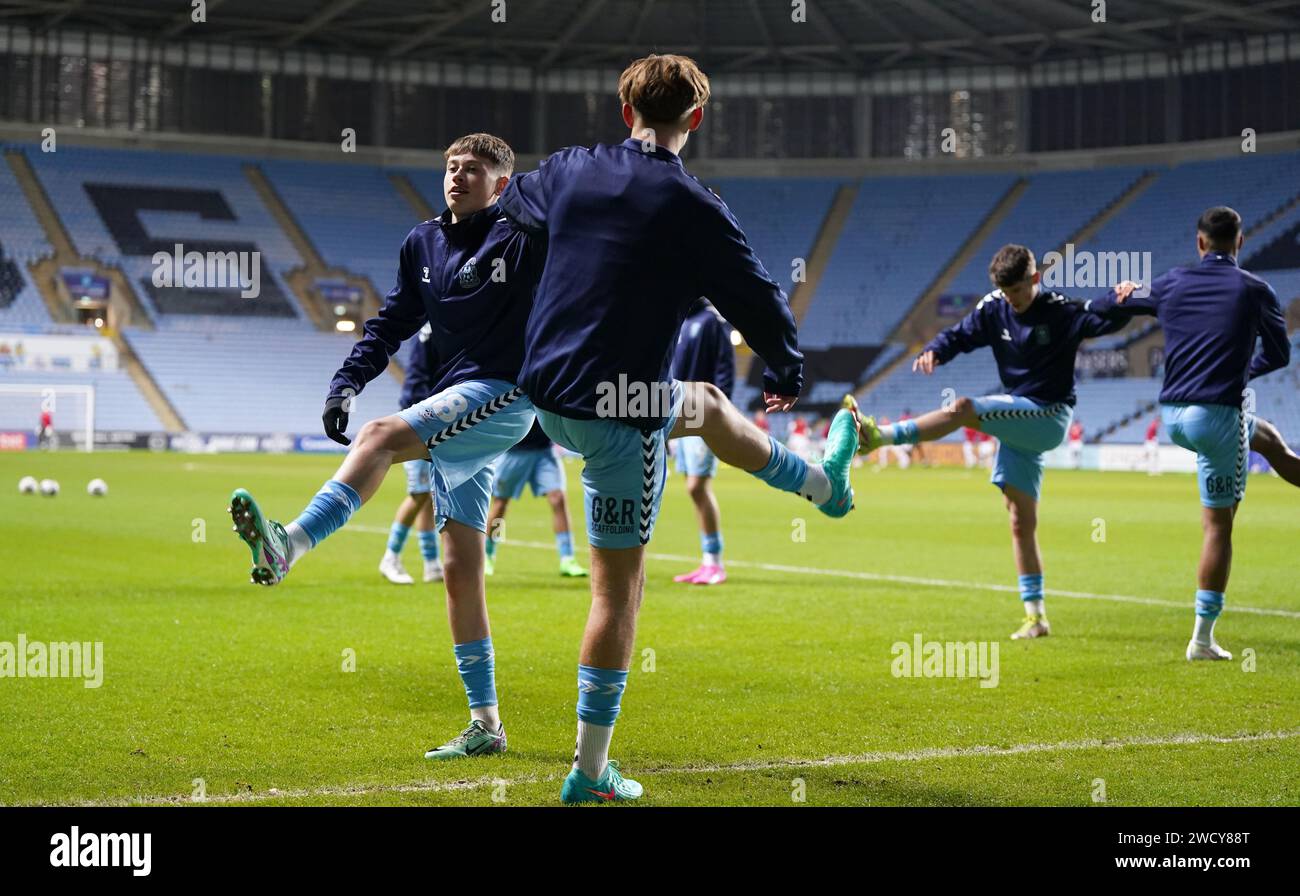 Coventry City's Jack James (left) and MacKenzie Stretton warming up ...