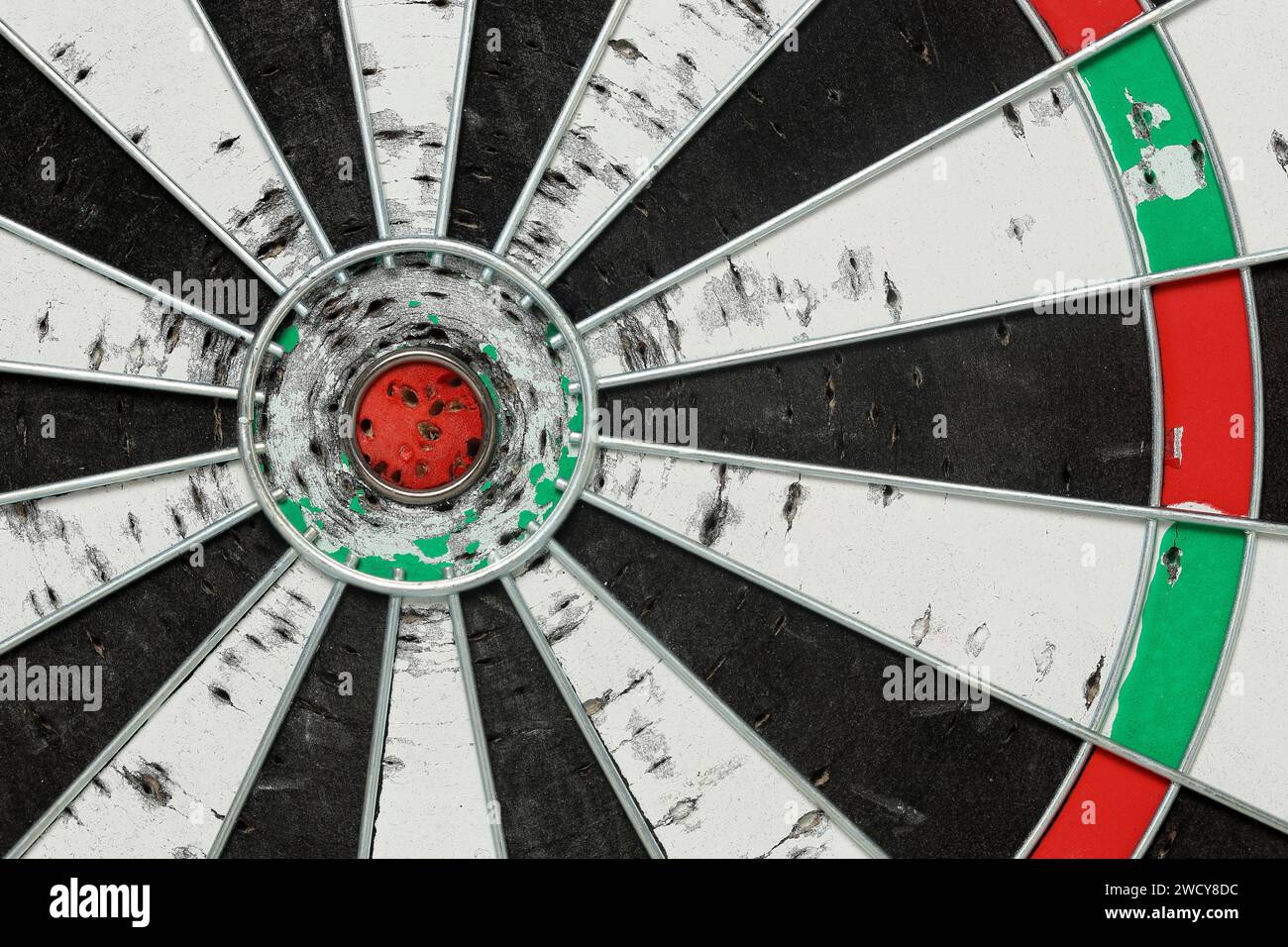 used dart board with holes close up Stock Photo - Alamy