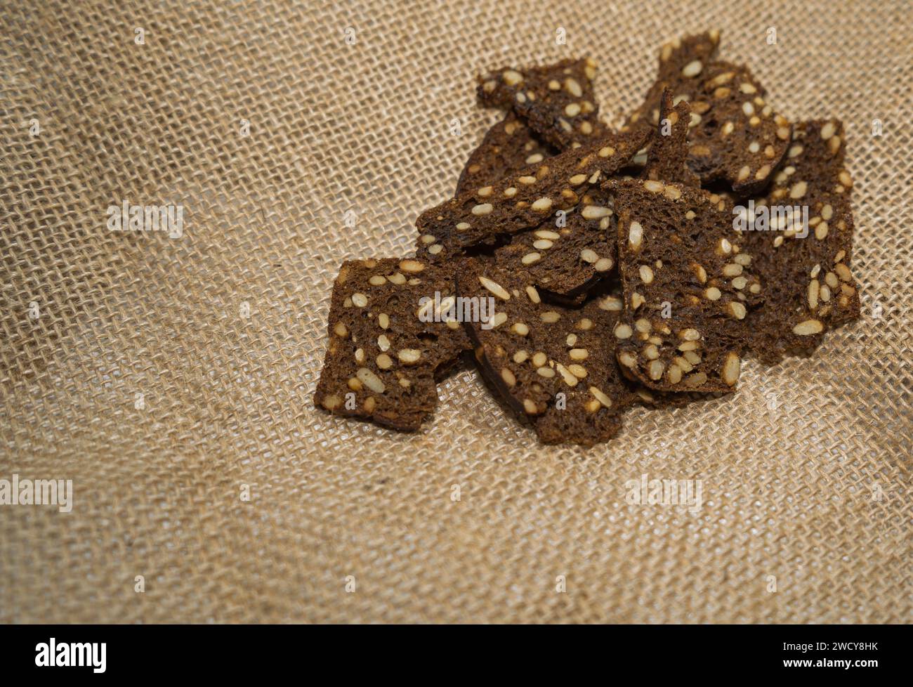 Bread thin crackers with sunflower seeds. dark rye crackers with seeds ...