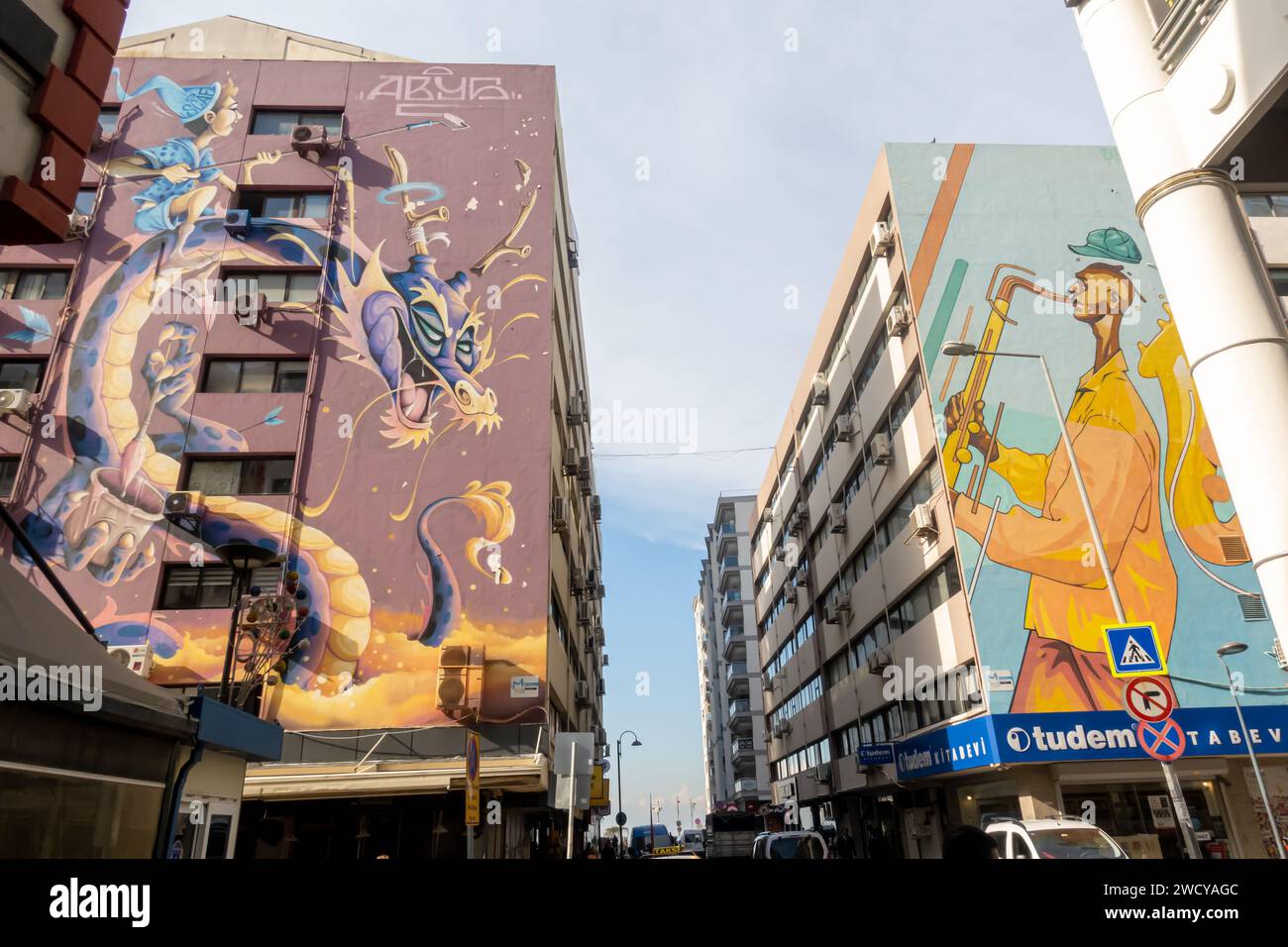 Ccolorful murals in Izmir: Mural depicting saxophone player and mural ...