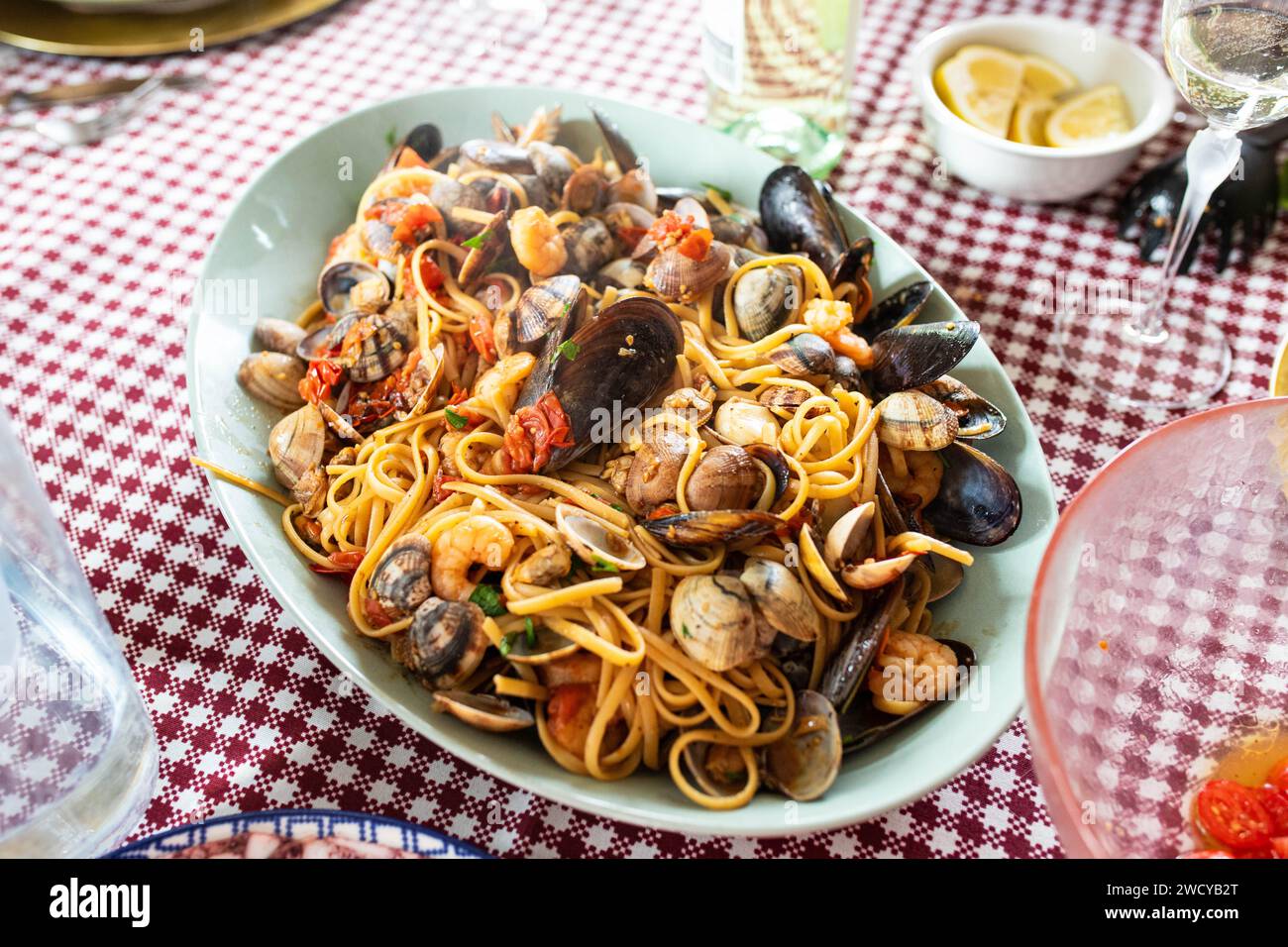 Spaghetti with seafood, also know as "allo scoglio", a typical italian ...