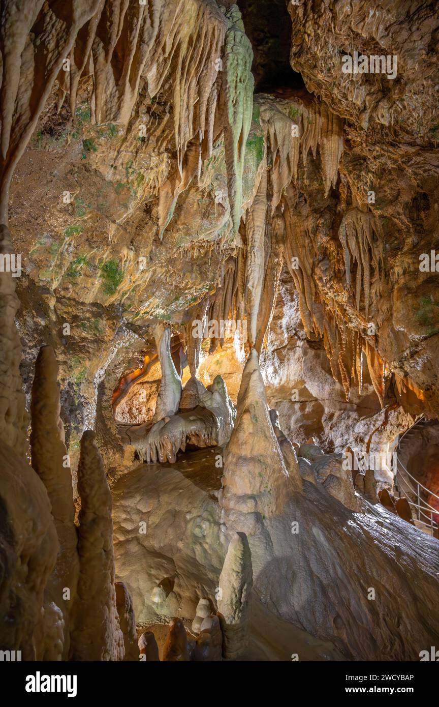 A uniquely designed cave nestled in a scenic mountainous region ...
