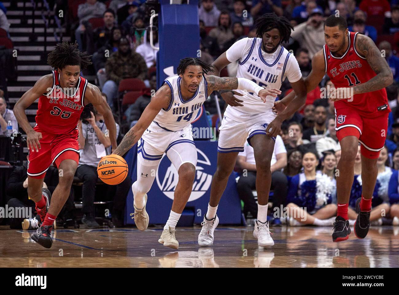 Seton Hall Pirates guard Dre Davis (14) pushes the ball up court during ...