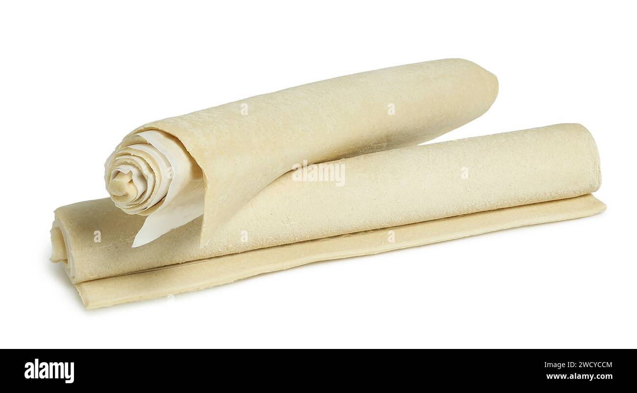 raw phyllo dough rolls isolated Stock Photo - Alamy