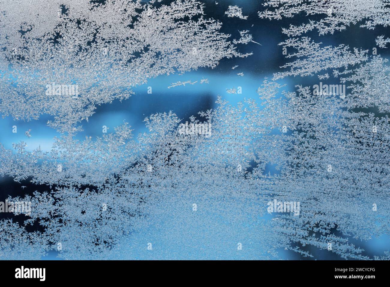 Frosty patterns on a frozen window, background Stock Photo - Alamy