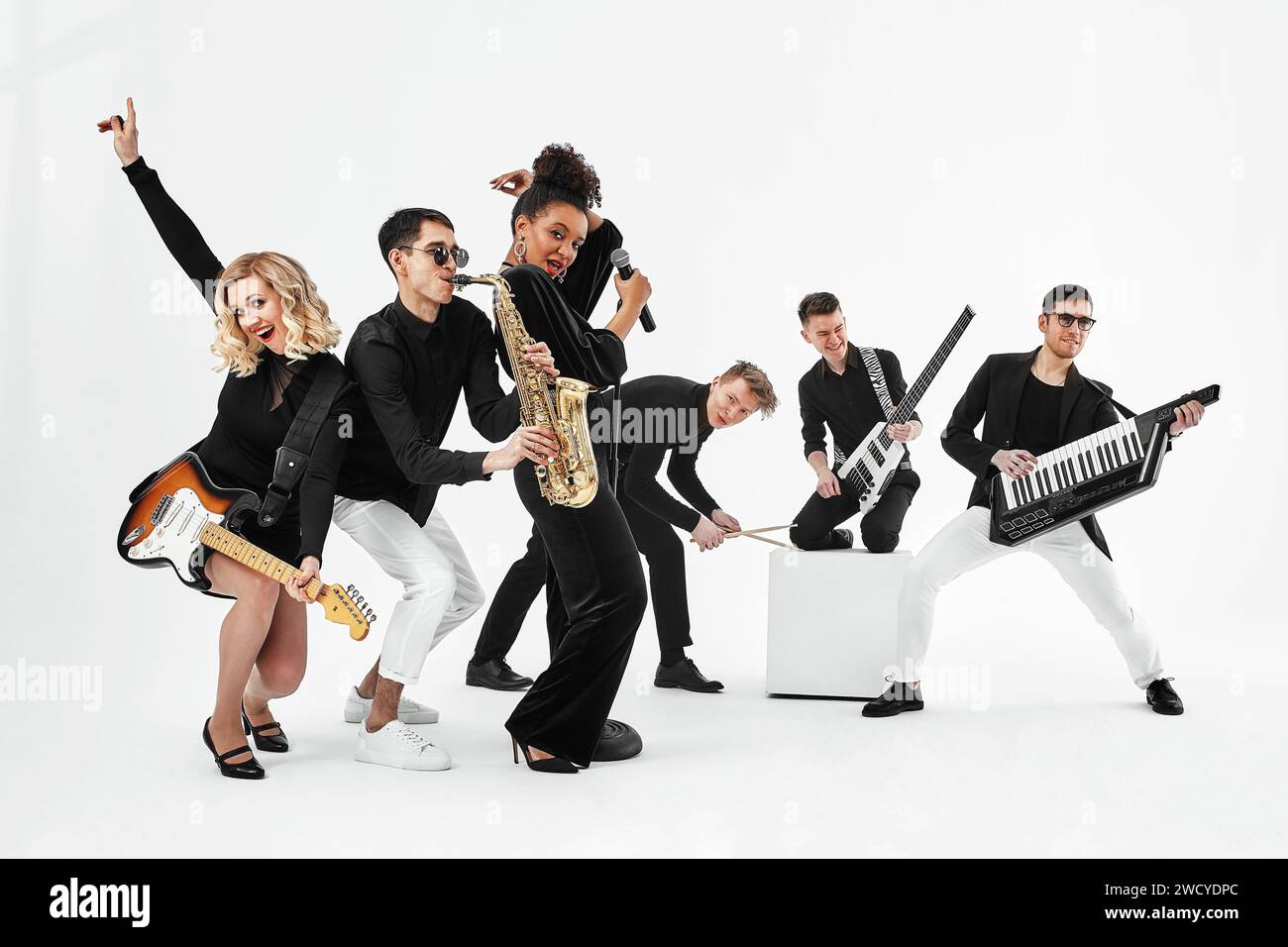 Entertaining concept, teamwork. International group of musicians on a ...