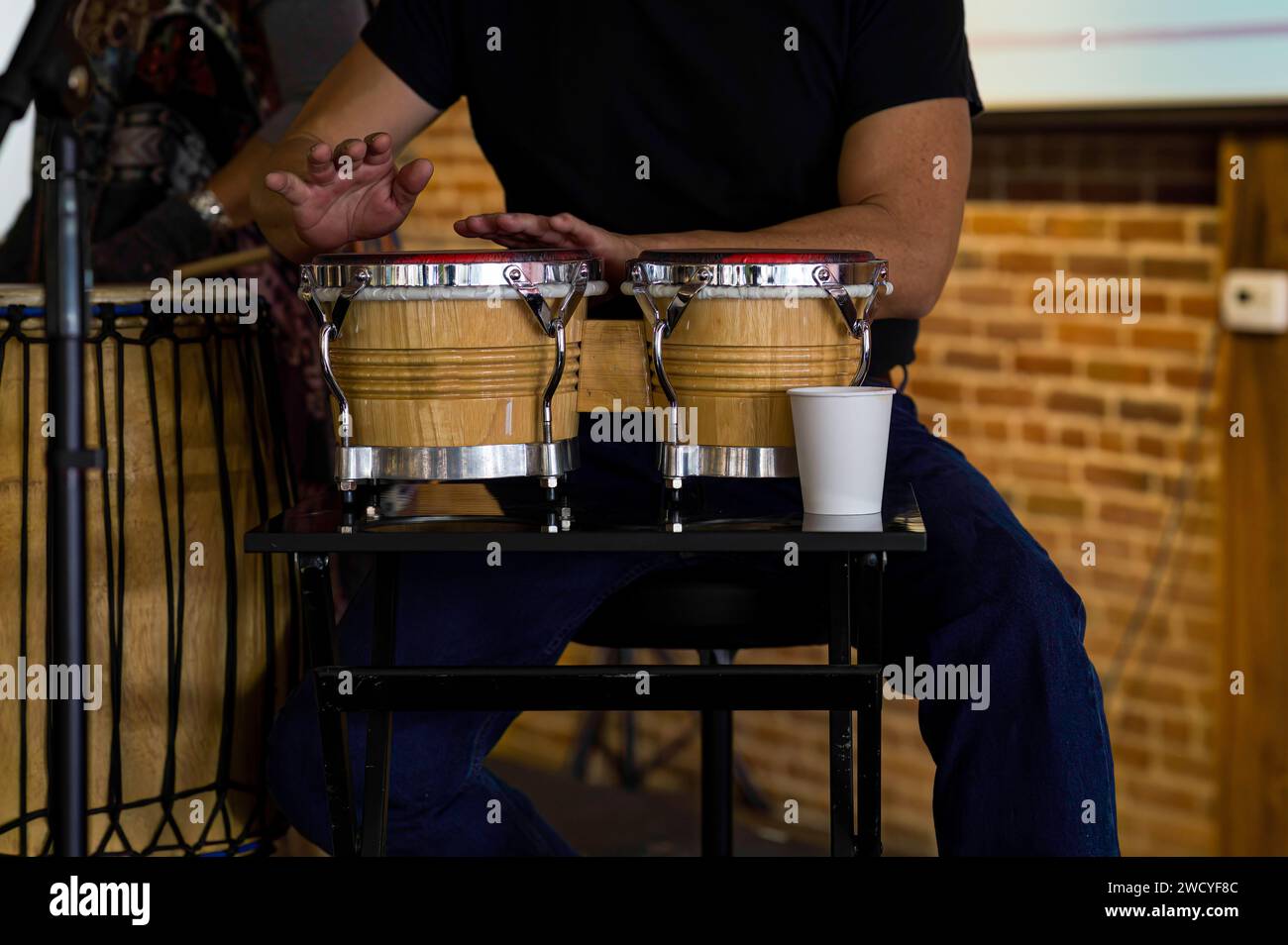 A man plays the bongo drums at a Martin Luther King, Jr. event Stock ...