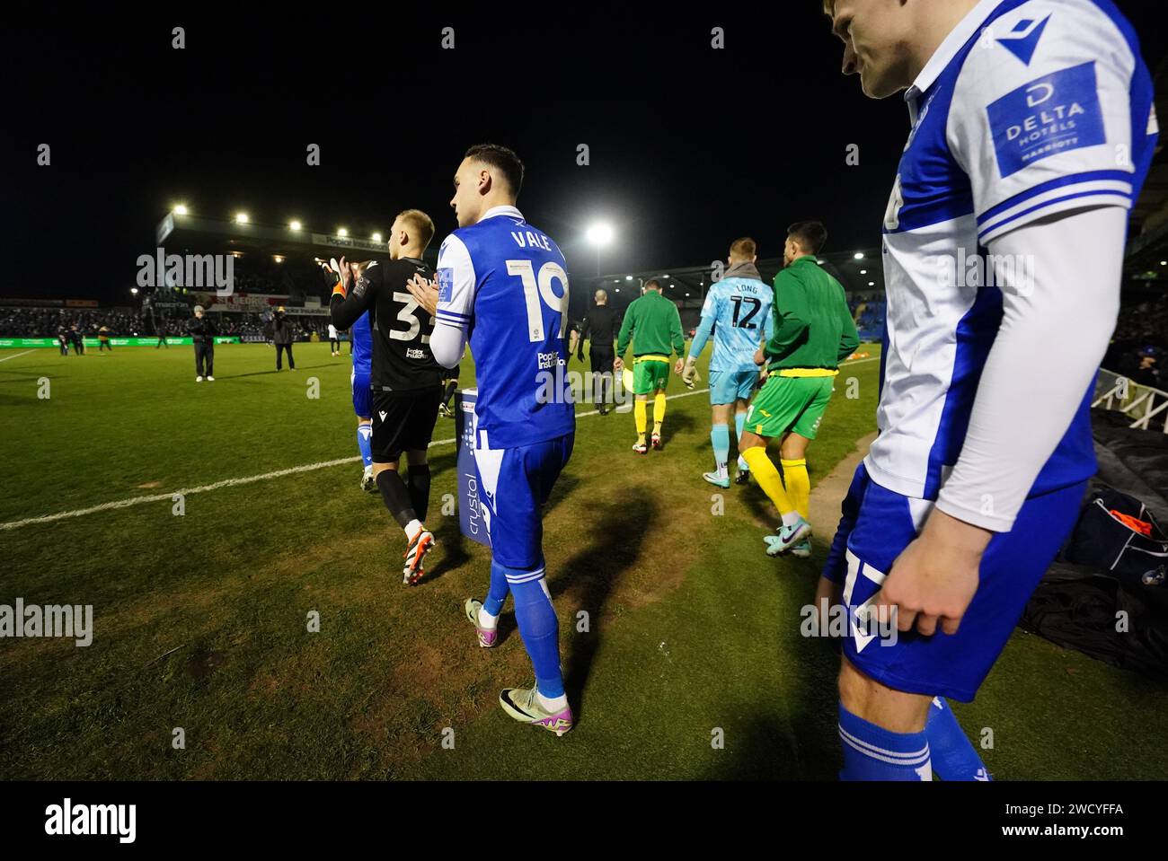 Bristol Rovers' Harvey Vale walks onto the pitch with his team-mates ...