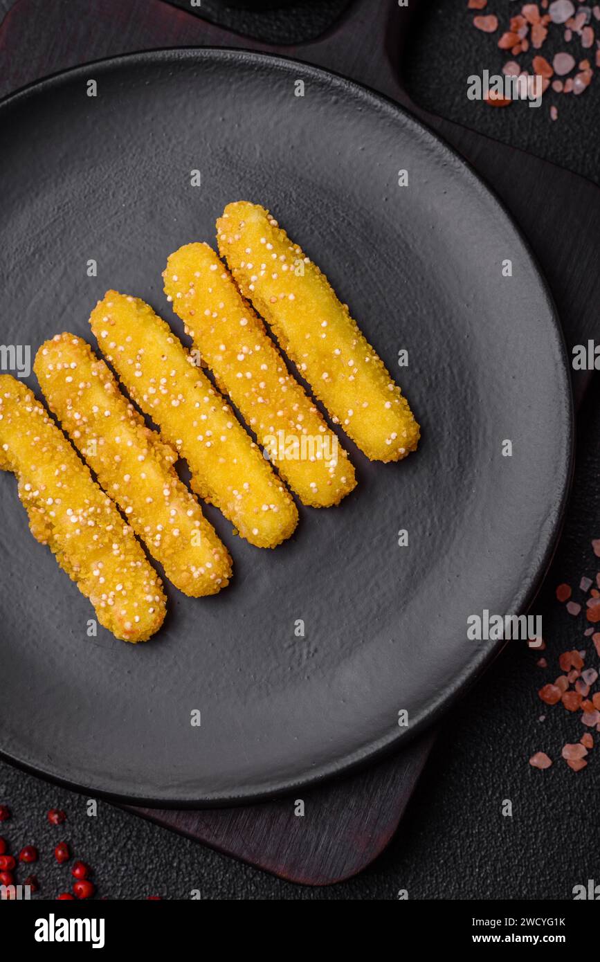Delicious crispy cheese sticks with mozzarella, salt and spices ...