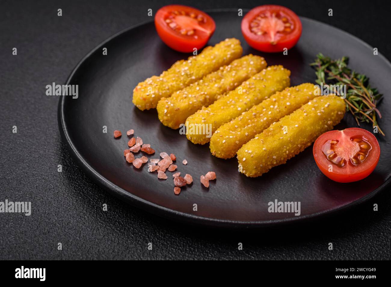 Delicious crispy cheese sticks with mozzarella, salt and spices ...