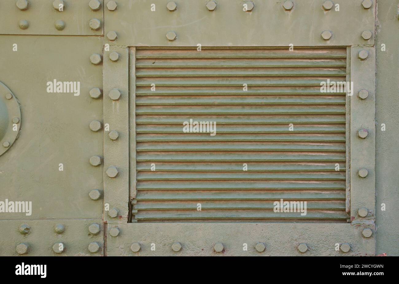 The texture of the wall of the tank, made of metal and reinforced with ...