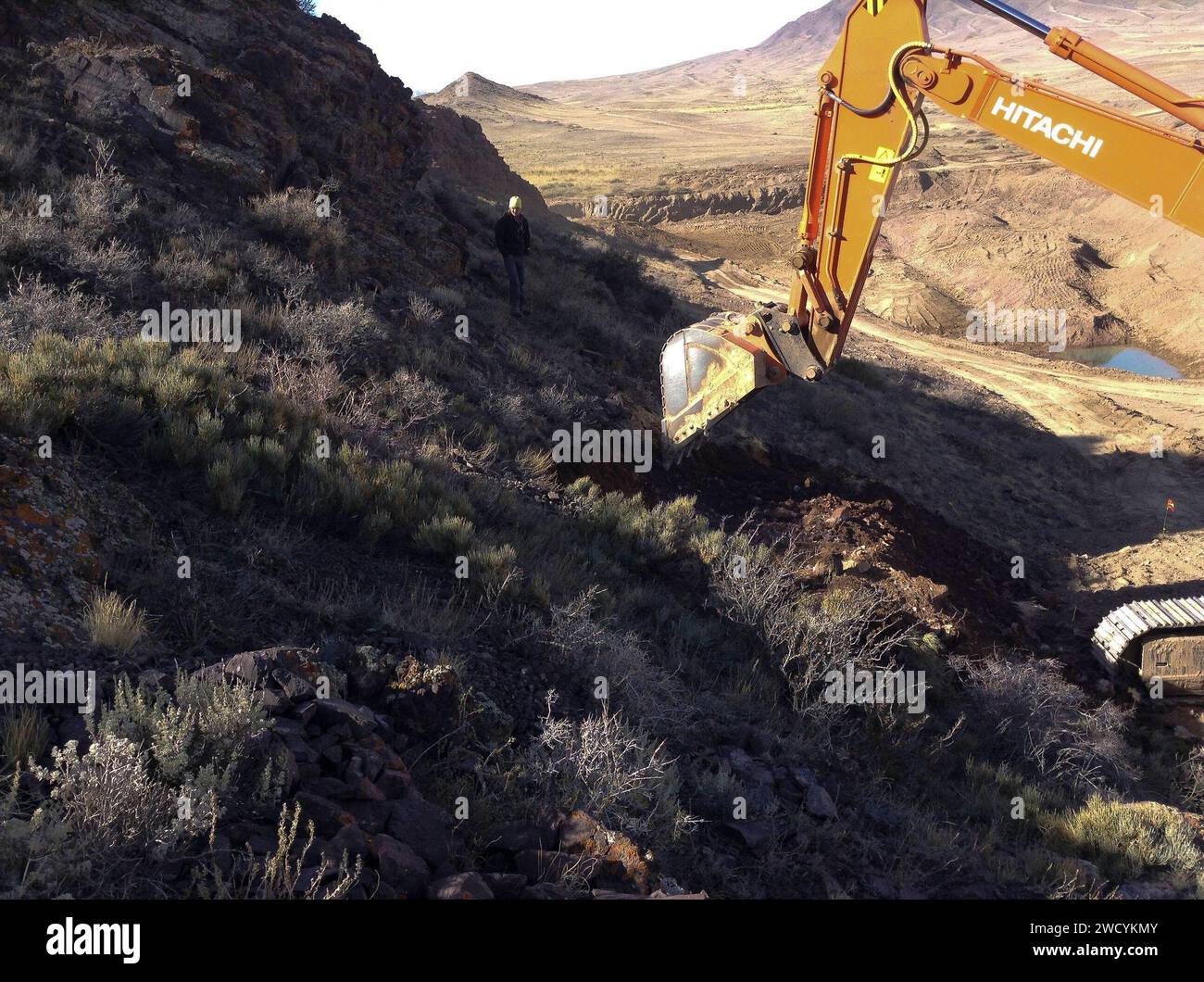 hitachi excavator at a construction site, heavy machinery for ...