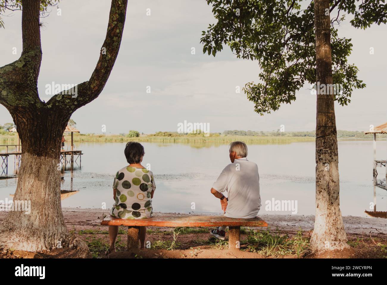 elderly couple enjoying the lake scenery Stock Photo - Alamy