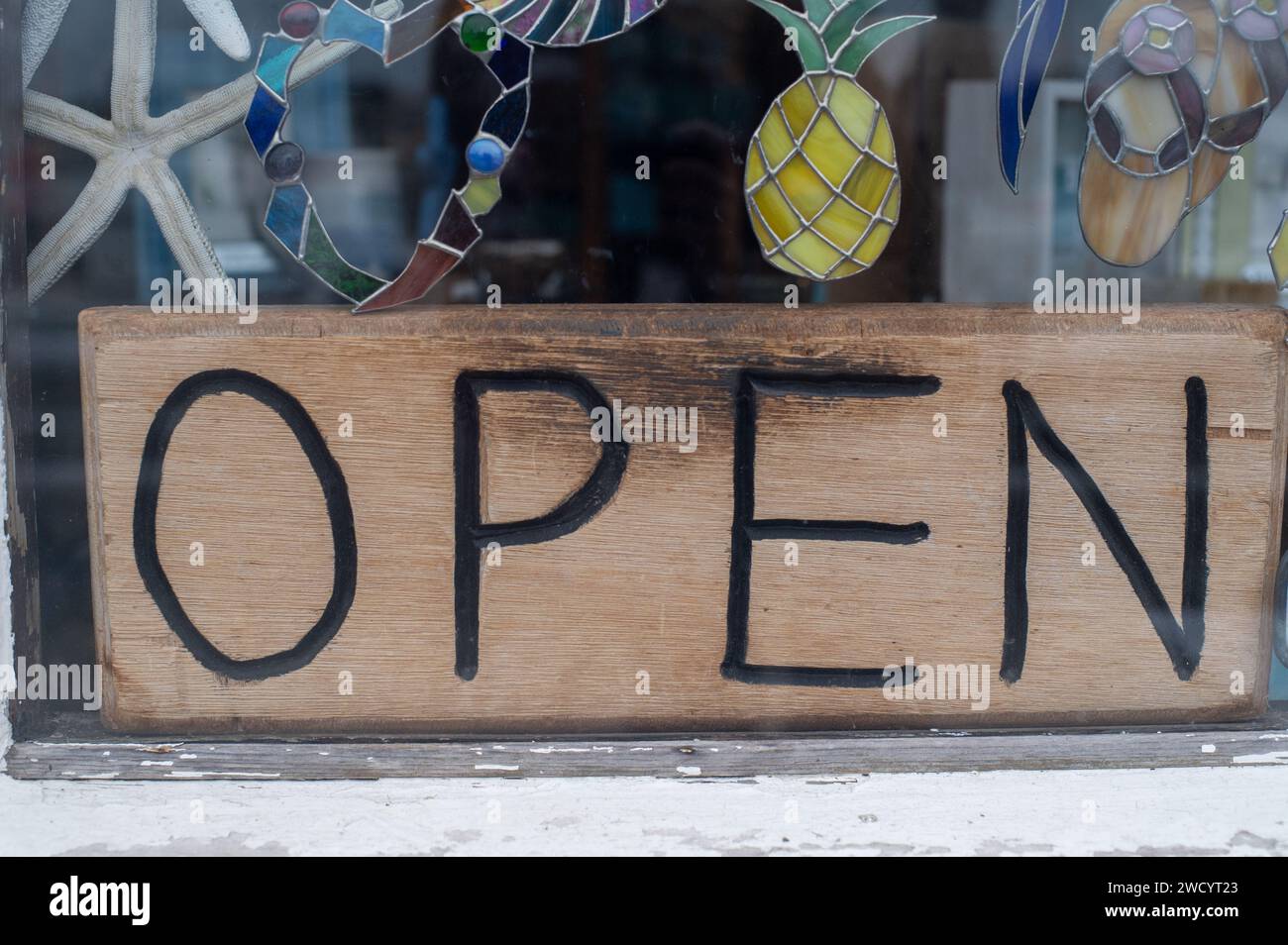 An Open sign in the store window Stock Photo - Alamy