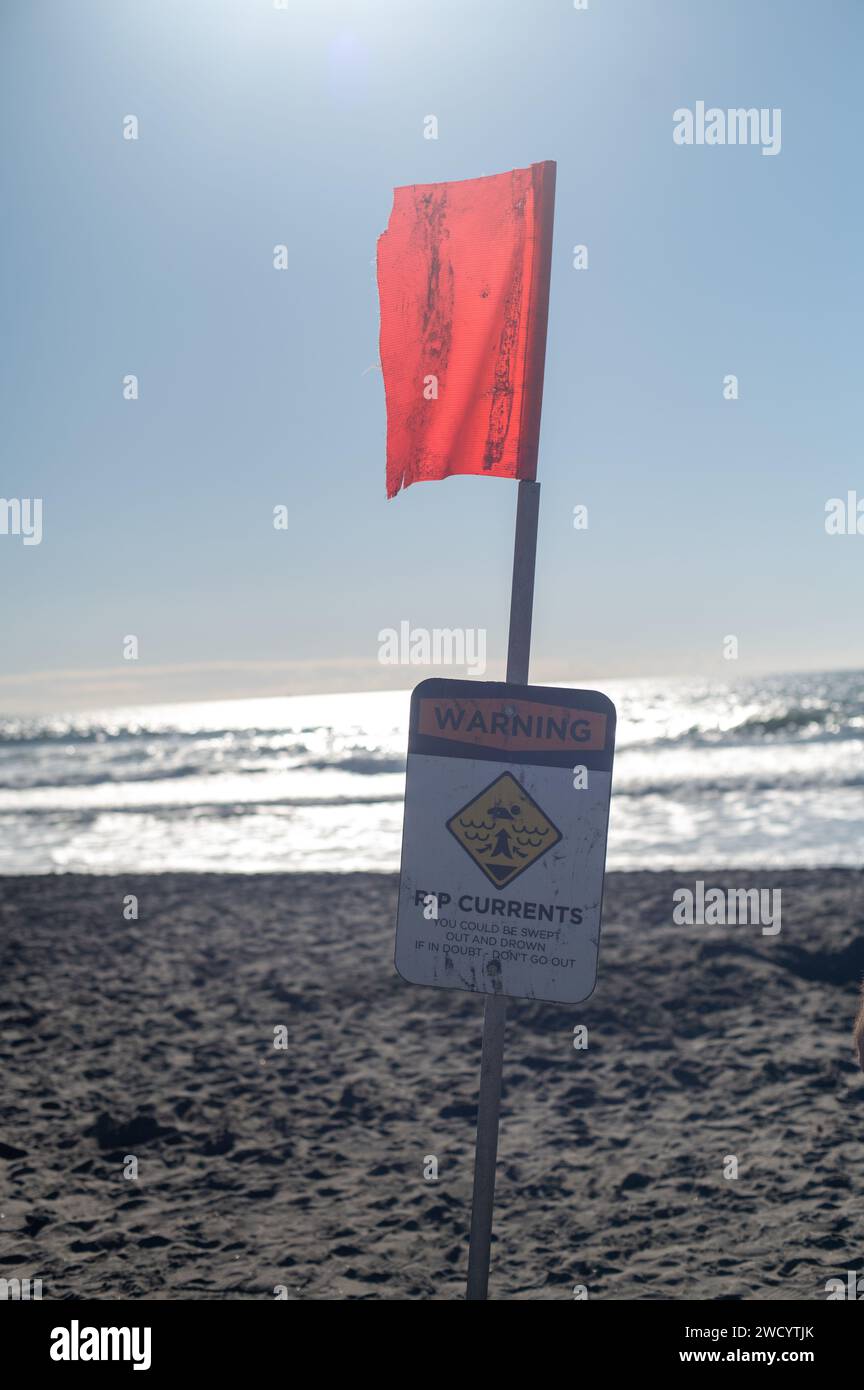 Warning side on the beach Stock Photo - Alamy