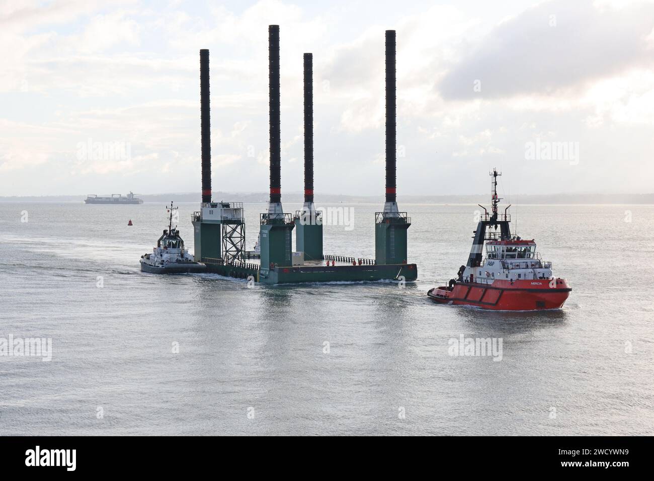 Commercial and harbour tugs tow the BAE Systems operated jack up barge ...