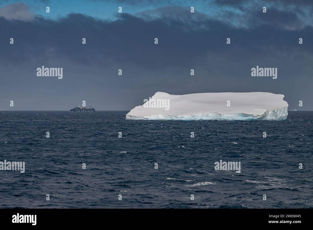 Ship near icebergs Brialmont Cove, Antarctica, Antarctic peninsula ...