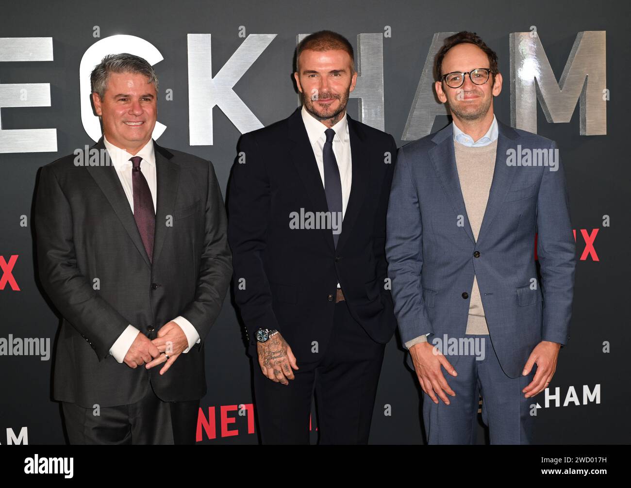 David beckham purple suit hi-res stock photography and images - Alamy