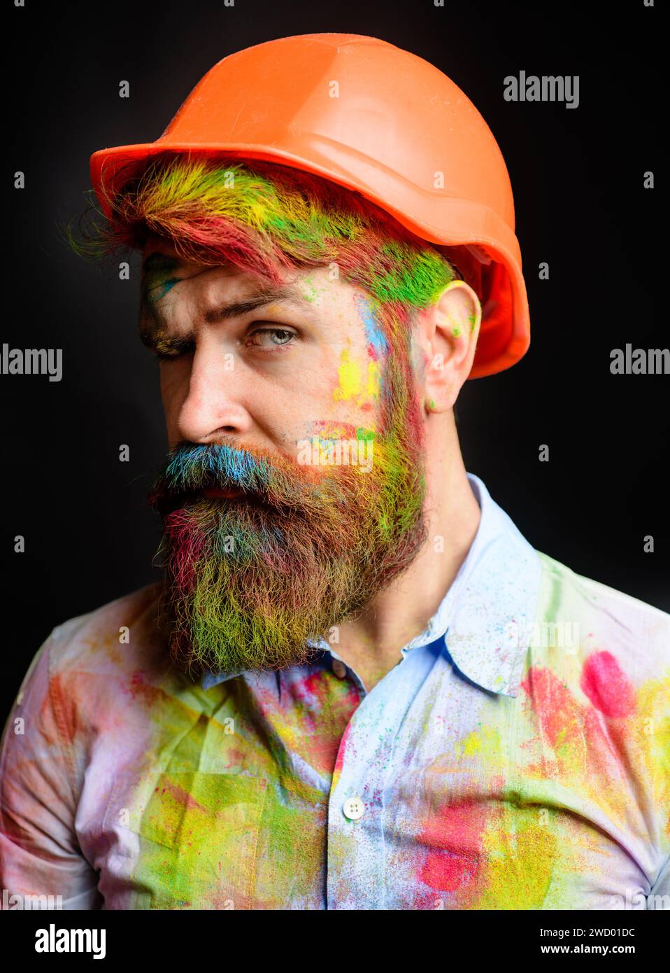Closeup portrait of professional painter, decorator or builder in hard ...
