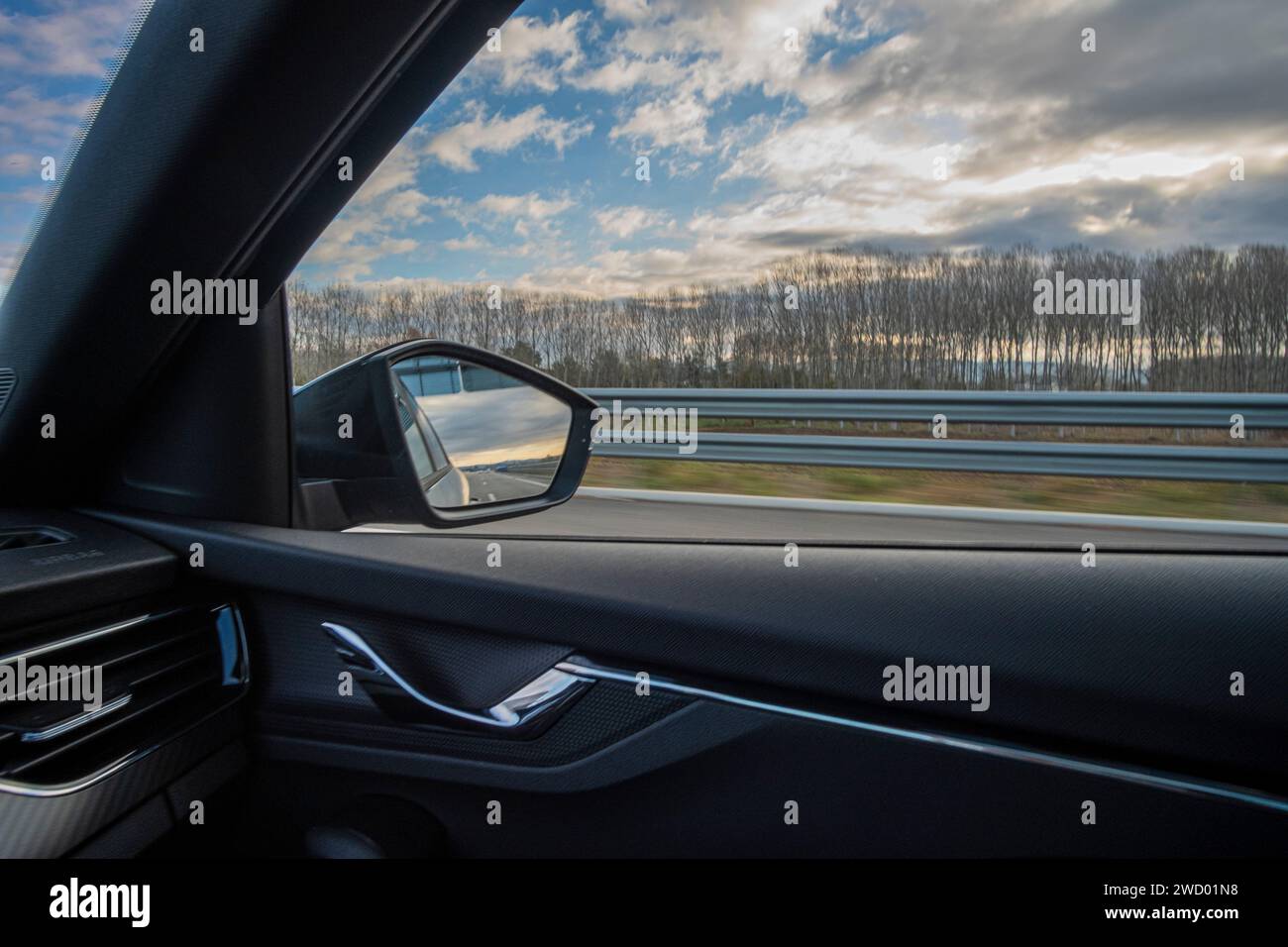 Right side window view scene of a road car on a highway on a beautiful ...