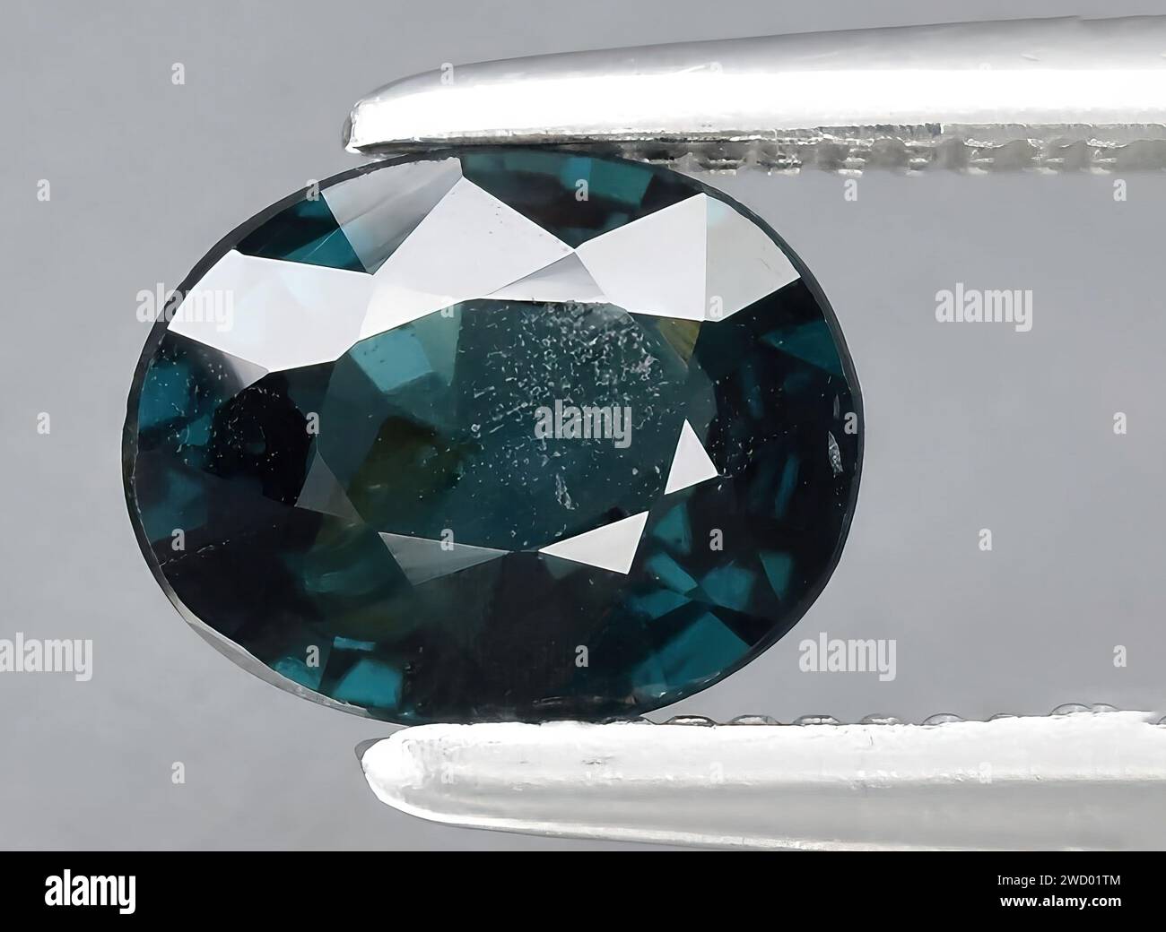 natural blue spinel gem on background Stock Photo - Alamy