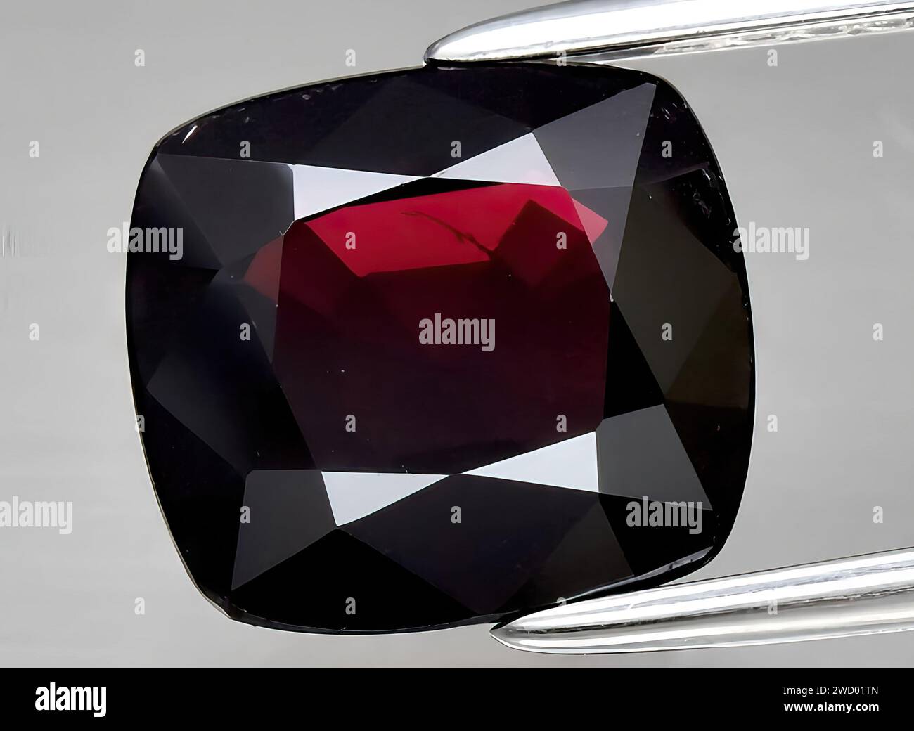 natural red spinel gem on background Stock Photo - Alamy