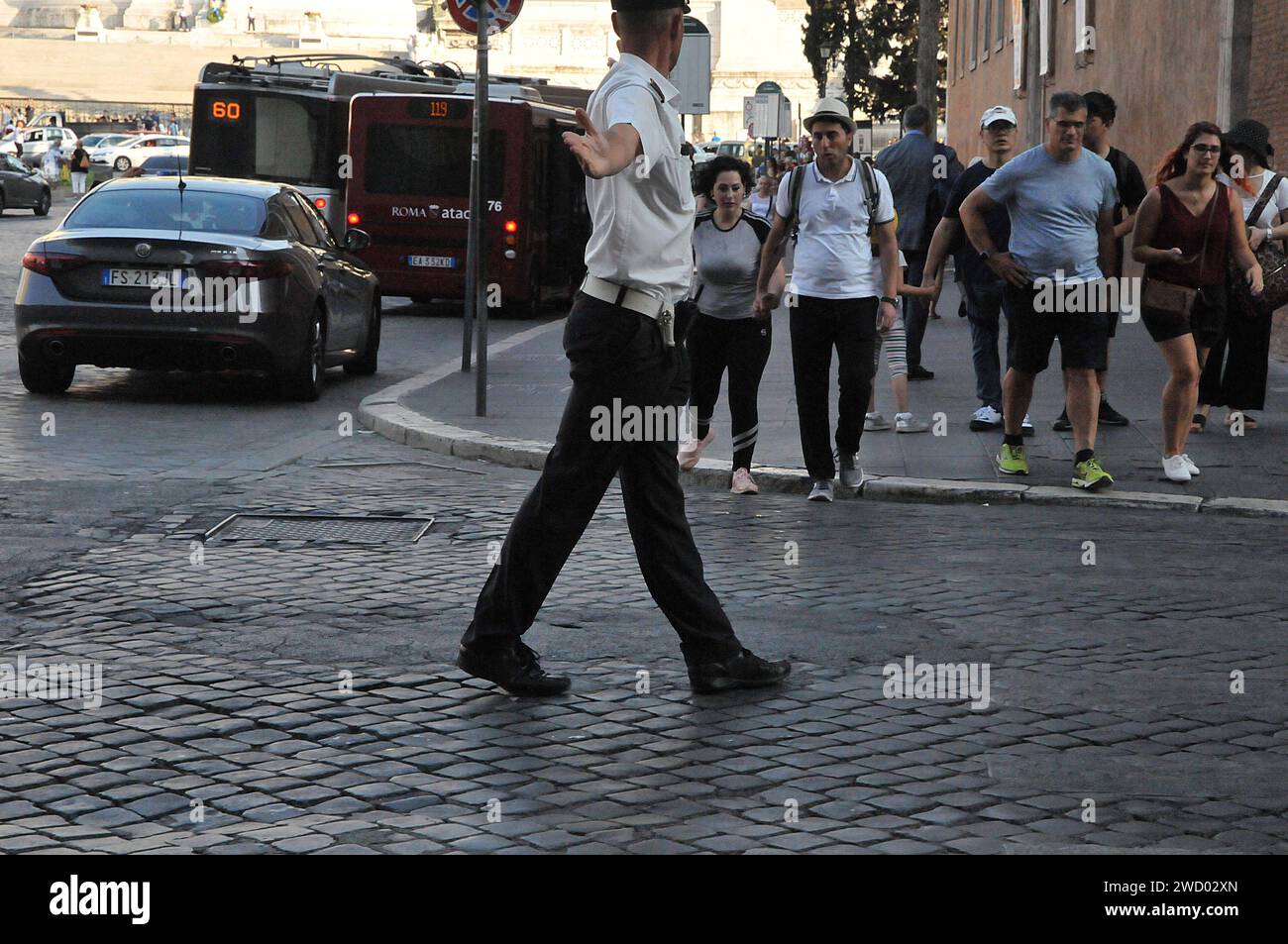Rome / Italy 18.July 2019/ Police officer instructing traffic choas at ...