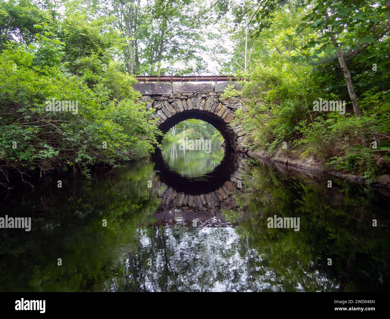 Stone Arch Bridge in Bristol, Maine, over the Pemaquid River from canoe ...