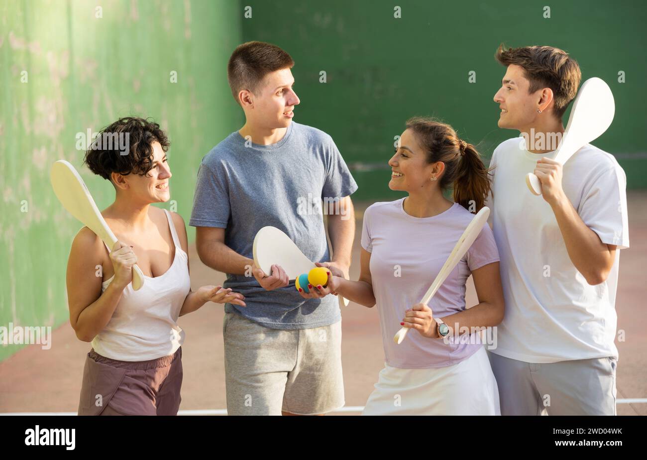 Basque pelota players chatting on outdoor fronton Stock Photo - Alamy