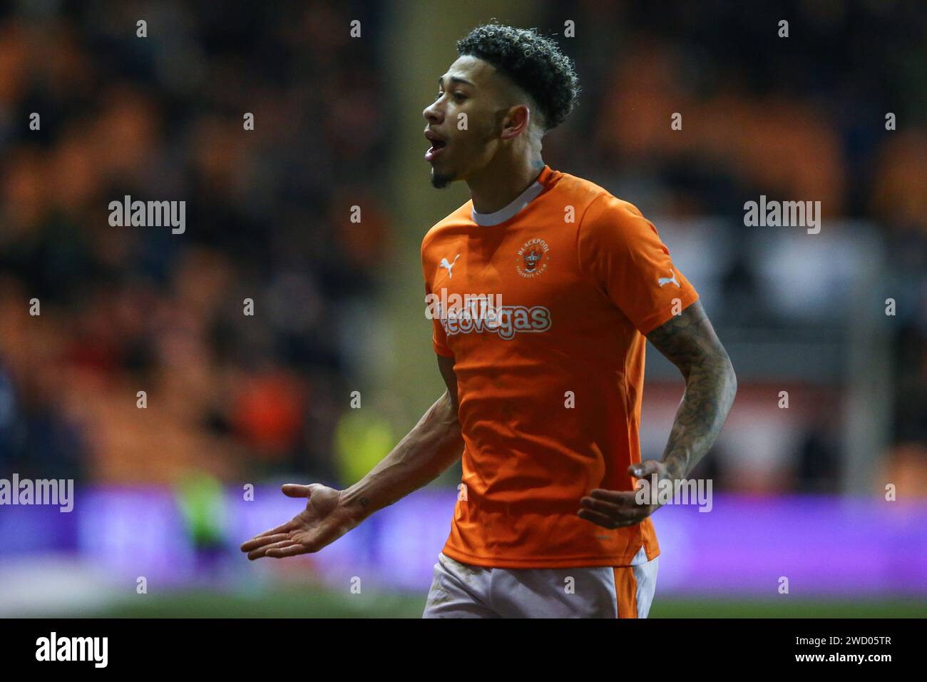 Jordan Lawrence-Gabriel of Blackpool gees up the crowd during the ...