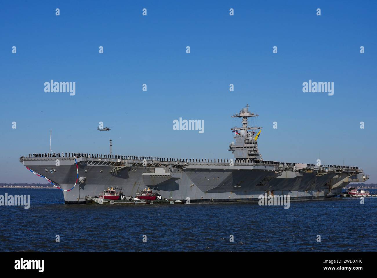 The Ford-class aircraft carrier USS Gerald R. Ford (CVN 78), along with ...