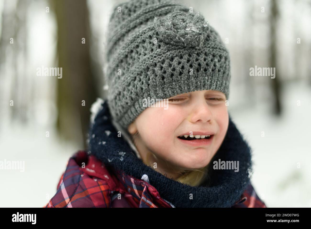 Little Girl Having Sad Time and Not Playing With Snow Outdoors During ...