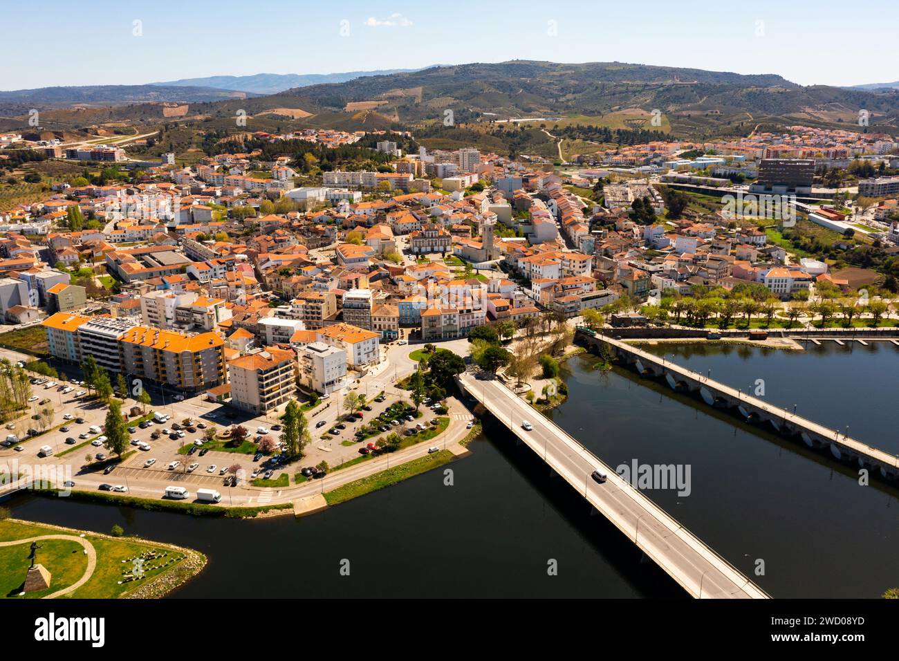 Aerial view of Mirandela city with bridges crossing Tua river, Portugal ...