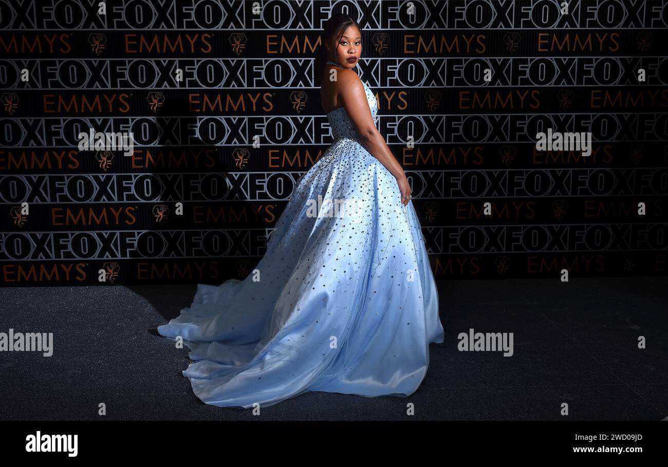 Dominique Fishback poses on the red carpet at the 75th Emmy Awards on ...