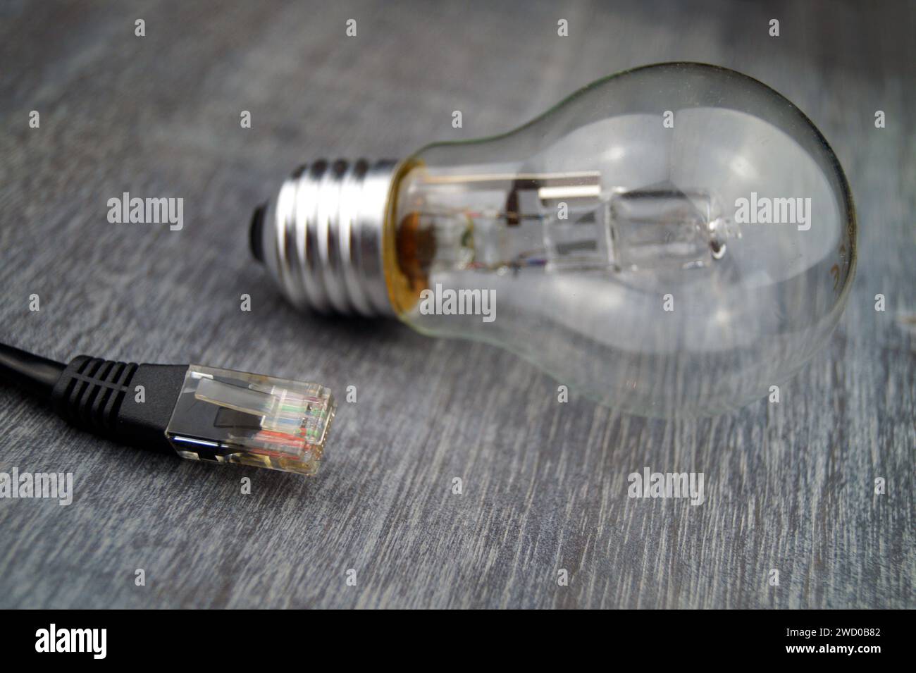 Network plug and light bulb, symbolic image for smart home Stock Photo ...