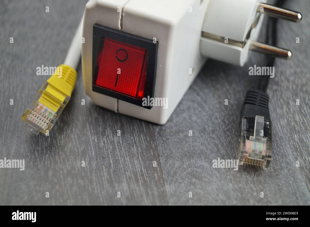 socket outlet adapter with switch and network plug, symbolic image for ...