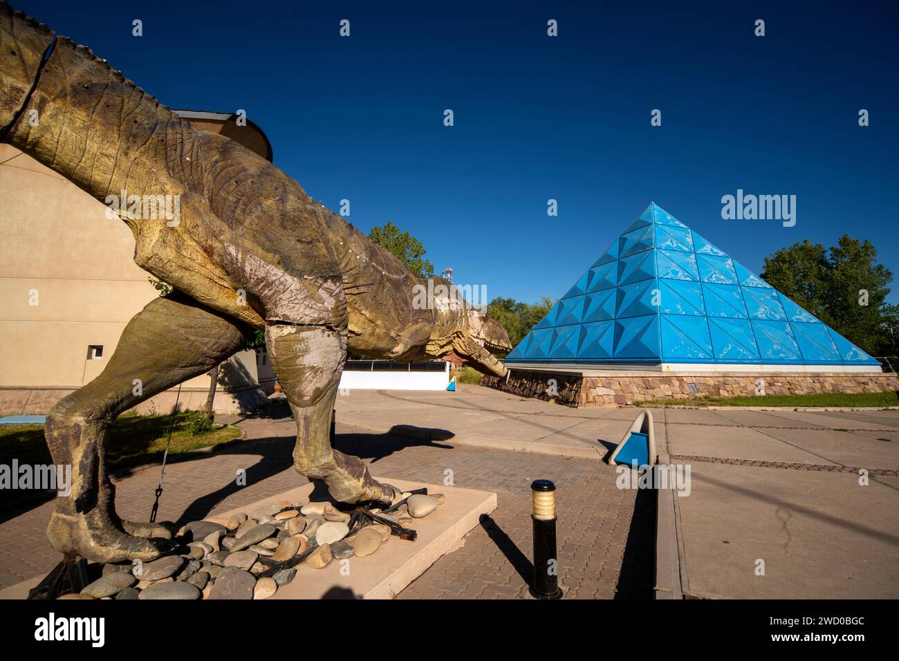 Dinossaur replica and pyramid on the Malargue Planetarium, Malargue ...