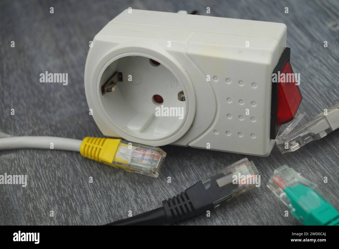 socket outlet adapter with switch and network plug, symbolic image for ...
