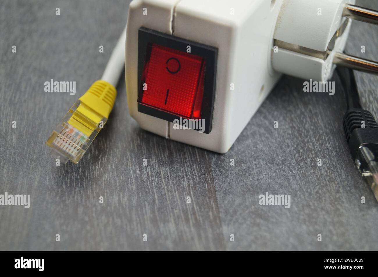 socket outlet adapter with switch and network plug, symbolic image for ...