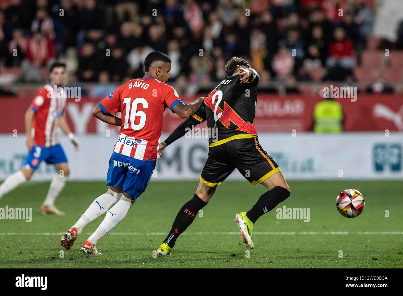 Girona, Spain. 17th Jan, 2024. Sávio Moreira de Oliveira (L) of Girona ...
