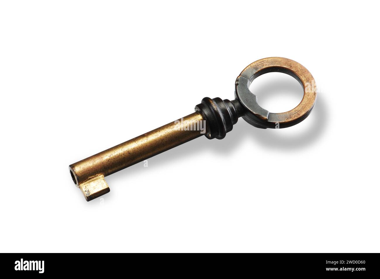 Old brass key on white with shadow Stock Photo - Alamy