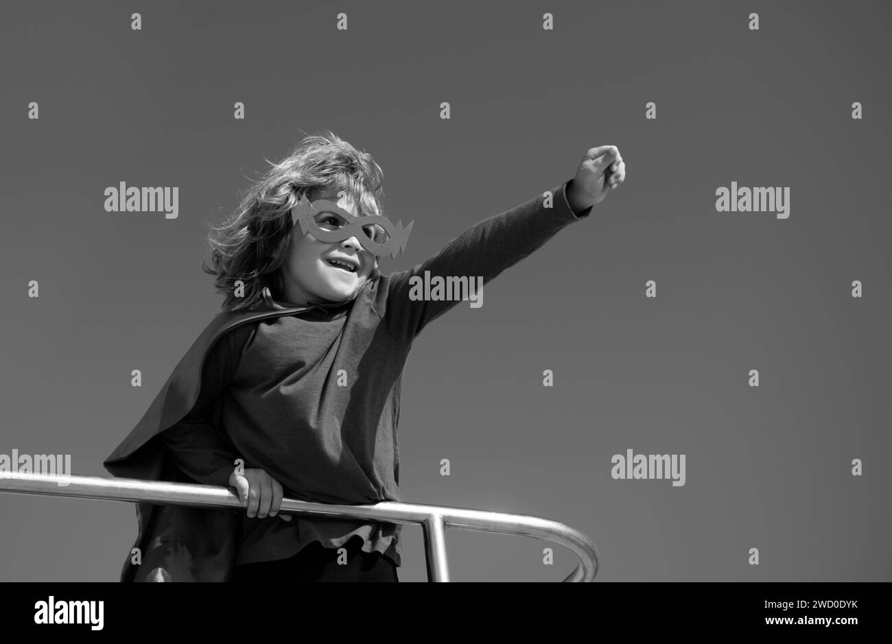 Super hero child in a red superhero coat. Super hero concept Stock ...