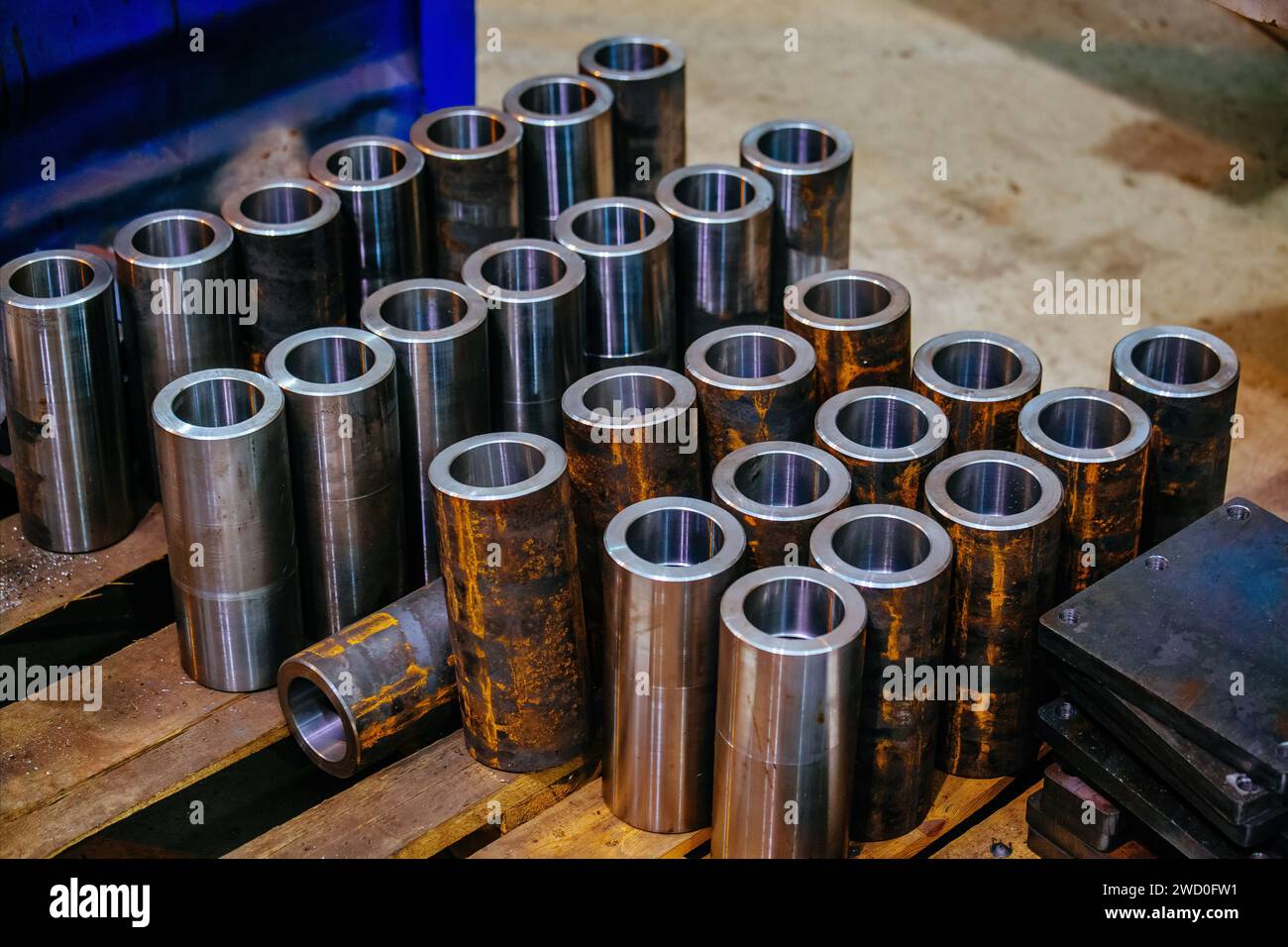 Steel bushings made on lathe. Spare parts Stock Photo - Alamy