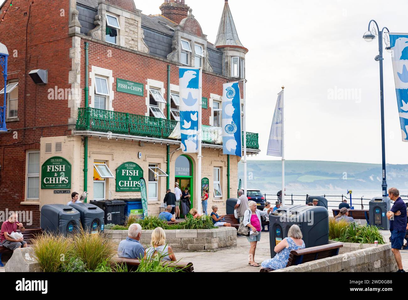 Fish and Chips takeaway restaurant, The Parade, with people eating ...
