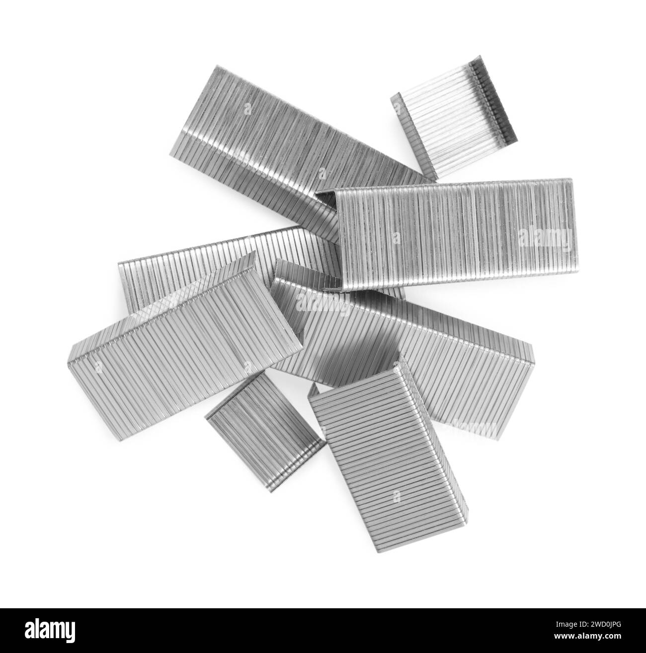 Many staple gun refills isolated on white, top view Stock Photo - Alamy