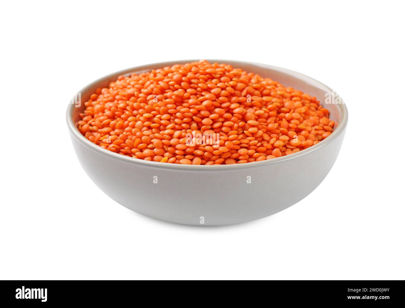 Raw red lentils in bowl isolated on white Stock Photo - Alamy